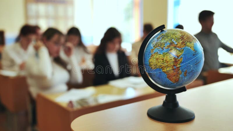 A Globe of the World in a School Classroom during a Lesson. Stock Video ...