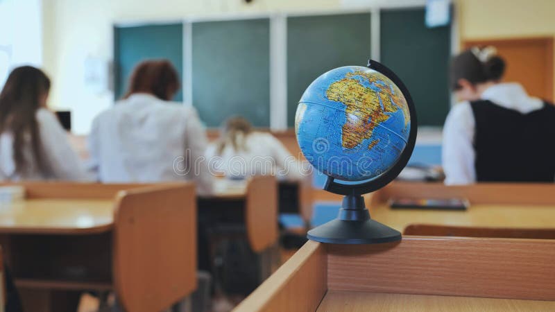 A Globe of the World in a School Classroom during a Lesson. the Globe ...