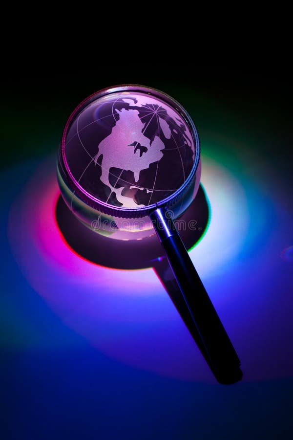 Globo y lupa foto de archivo. Imagen de tierra, mundo - 186790542