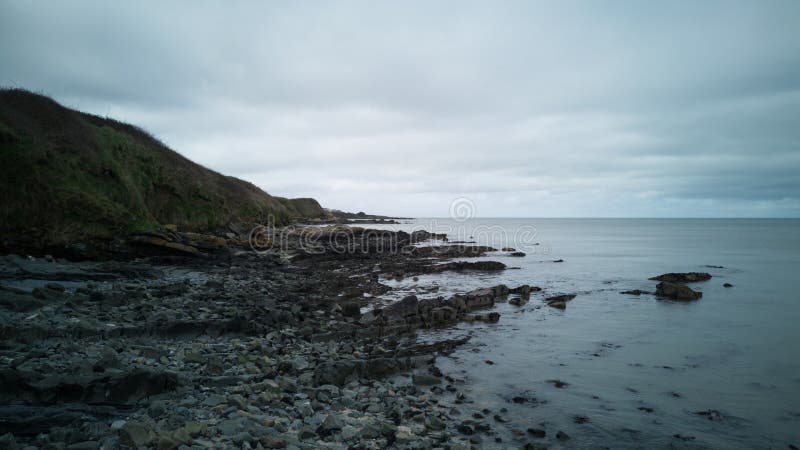 Gloomy Beach Scene in Ireland Stock Photo - Image of horizon, natural ...