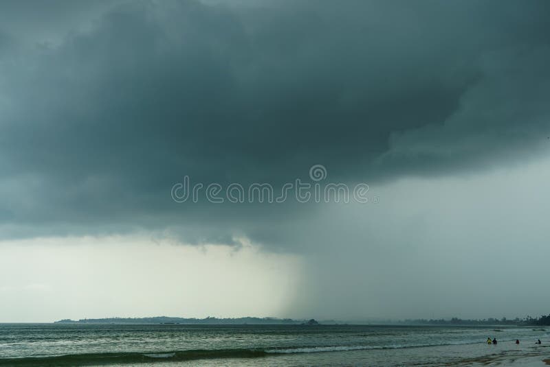 Gloomy Overcast Sky with Heavy Rain on the Beach Stock Photo - Image of ...