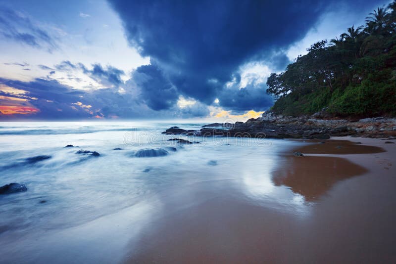 Gloomy tropical sunset. stock image. Image of culture - 22980239