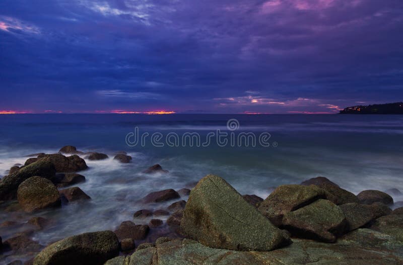 Gloomy tropical sunset stock image. Image of rock, beautiful - 151641887