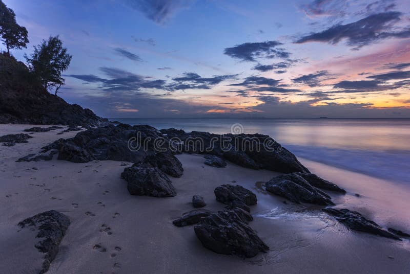 Gloomy tropical sunset stock image. Image of evening - 109346463