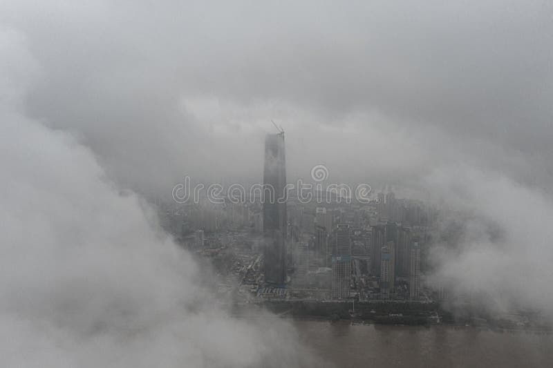 Gloomy View of a City on the Waterfront through Clouds Stock Image ...