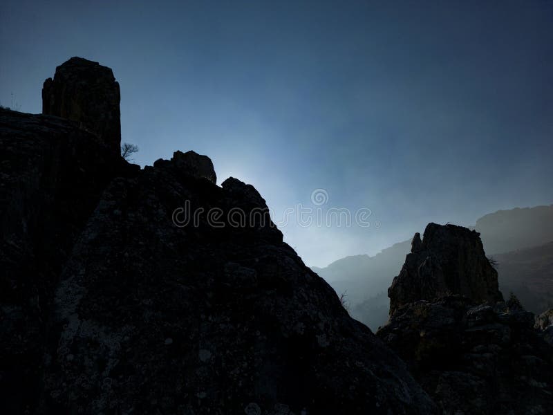 Gloomy Weather in the Mountains and Magnificent Silhouette Textured Cliffs Stock Image - Image ...