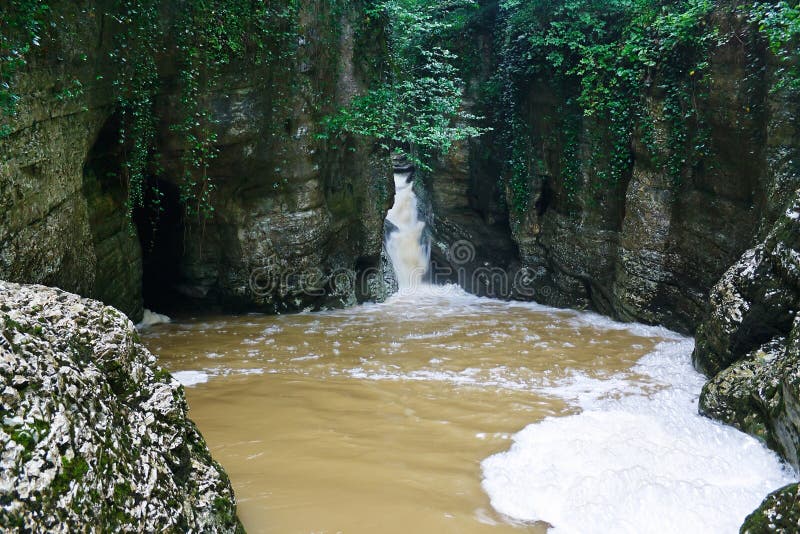 Glorious Rapid Waterfall Falling between the Rocks among Southern ...