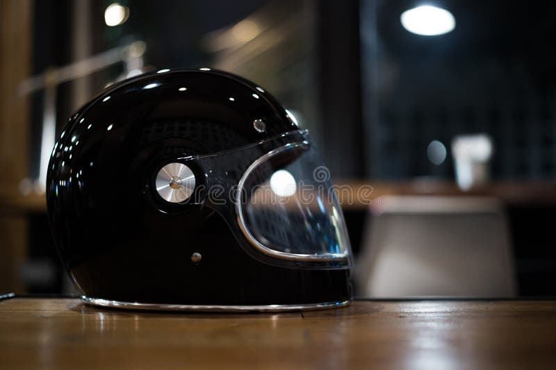 Glossy Black Helmet on Table Stock Photo - Image of ride, gloss: 97253288