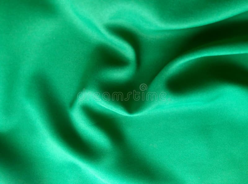 Glossy green cloth ripple stock image. Image of pastel - 237972431