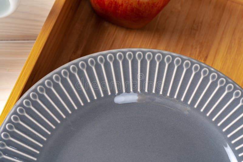 Glossy Grey Ceramic Plate with Cutlery on Wooden Table Stock Image ...