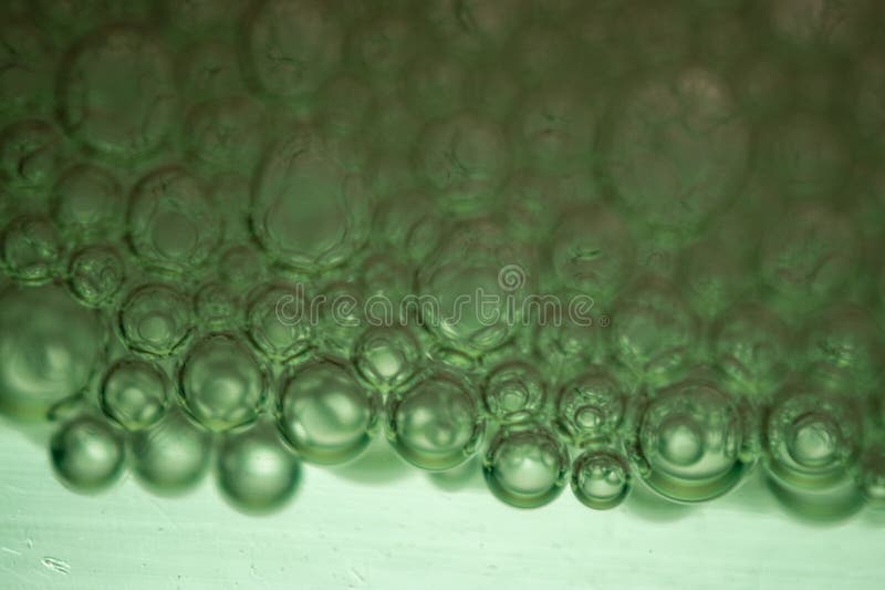 Glossy, Light Green Background with an Abundance of Soap Bubbles ...