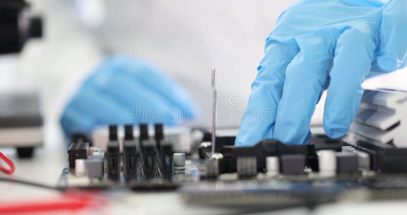 Gloved Engineer Inserts Microcircuit into Computer Motherboard Stock ...