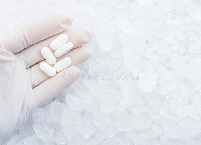 Gloved Hand Holding Glucose Tablets on Icy Surface Stock Photo - Image ...