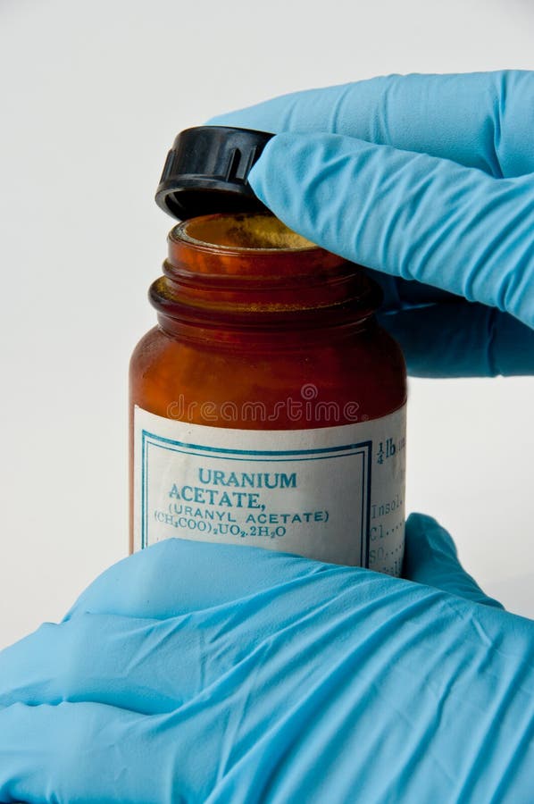 Gloved Hands Opening a Bottle of Uranium Acetate Stock Image - Image of ...