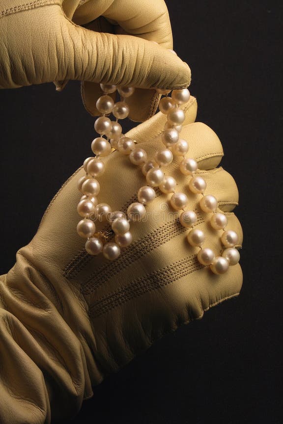 Gloved Hands Playing with a String of Pearls Stock Photo - Image of ...