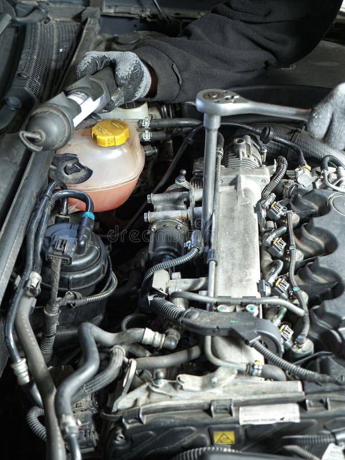 Glow plug replacement stock photo. Image of plug, automobile - 38330800