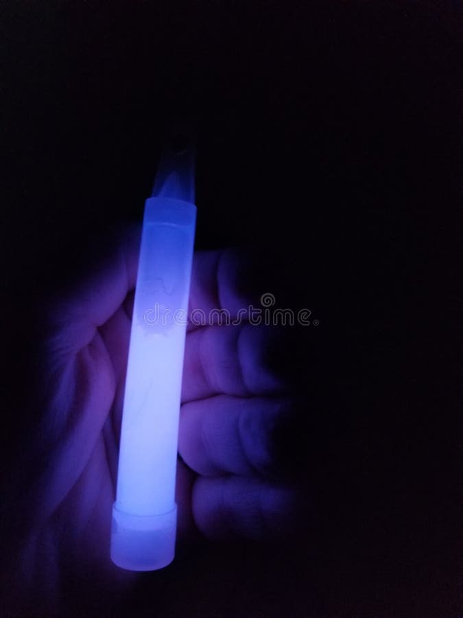 Glow stick in womans hand stock image. Image of womans - 123785211
