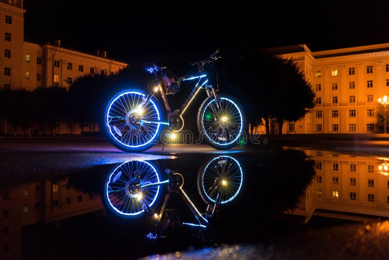 Glowing Bicycle is Reflected in the Water. Stock Photo - Image of ...