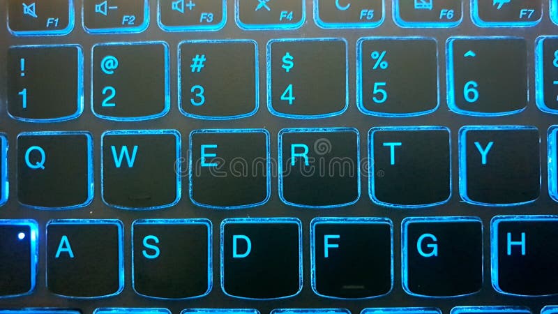 Glowing Blue Light Qwerty Keyboard Stock Photo - Image of science ...
