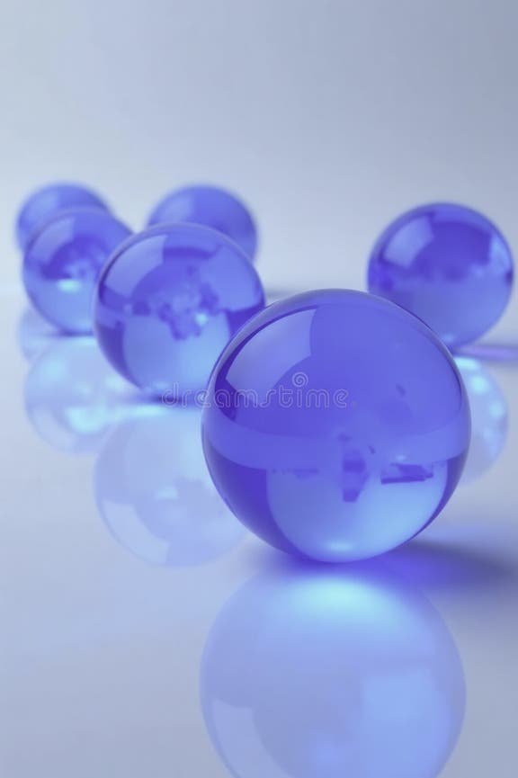 Glowing Blue Orbs Positioned at Different Angles To Create Depth ...