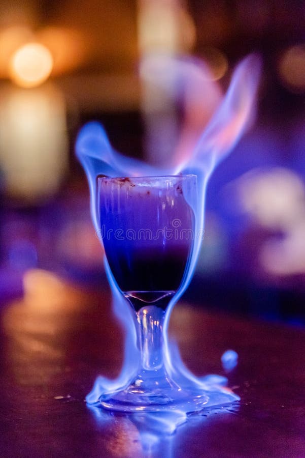 Glowing and Burning Cocktail in the Glass on the Bar Table Stock Image ...
