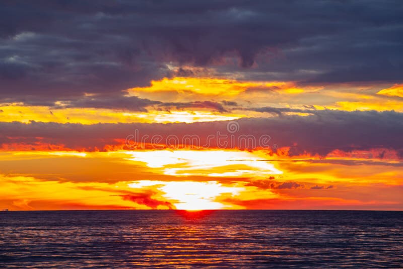 Glowing and Burning Sunset Over Ocean. Stock Image - Image of ...