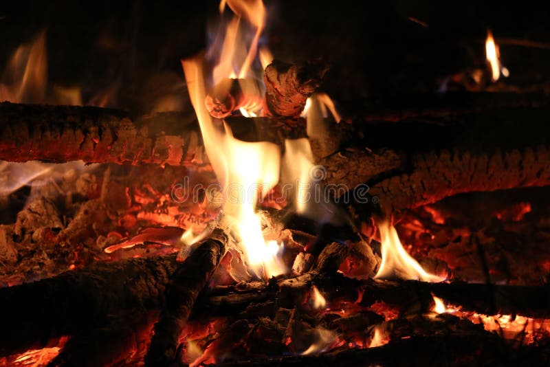 Glowing Campfire with Flames Stock Photo - Image of yellow, glowing ...