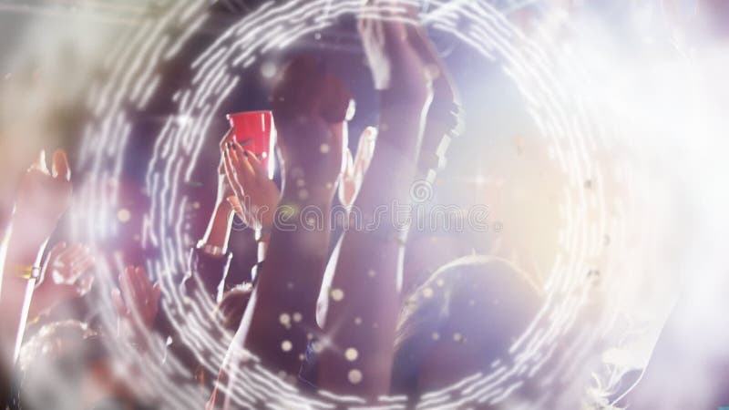 Glowing Circle Moving Against People Dancing in a Concert Stock Video ...