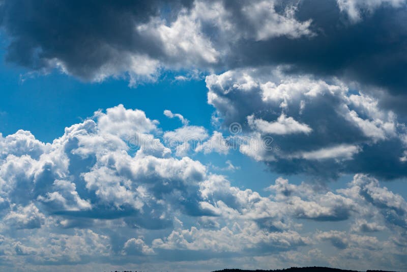 Glowing Clouds on a Background of Blue Sky. White Fluffy Luminous Cloud ...