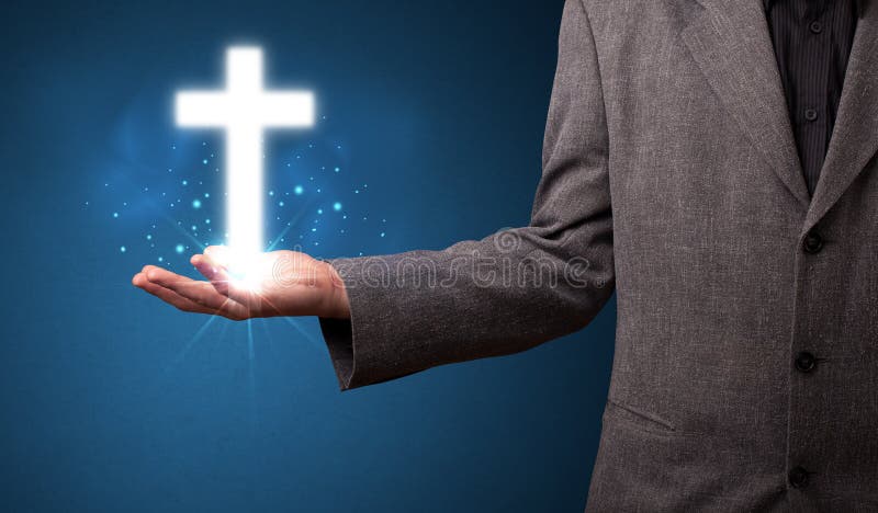 Glowing Cross in the Hand of a Businessman Stock Photo - Image of holy ...