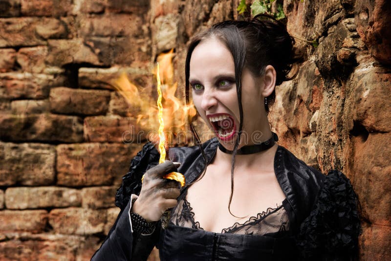 Glowing dagger stock photo. Image of brunette, gothic - 36500708