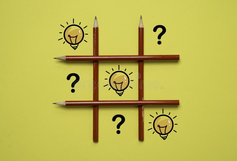 Glowing Drawing Lightbulb and Question Mark on Tic Tac Toe Table for ...