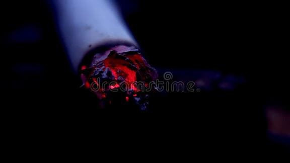 The Glowing Embers of a Lit Cigarette Stock Photo - Image of embers ...