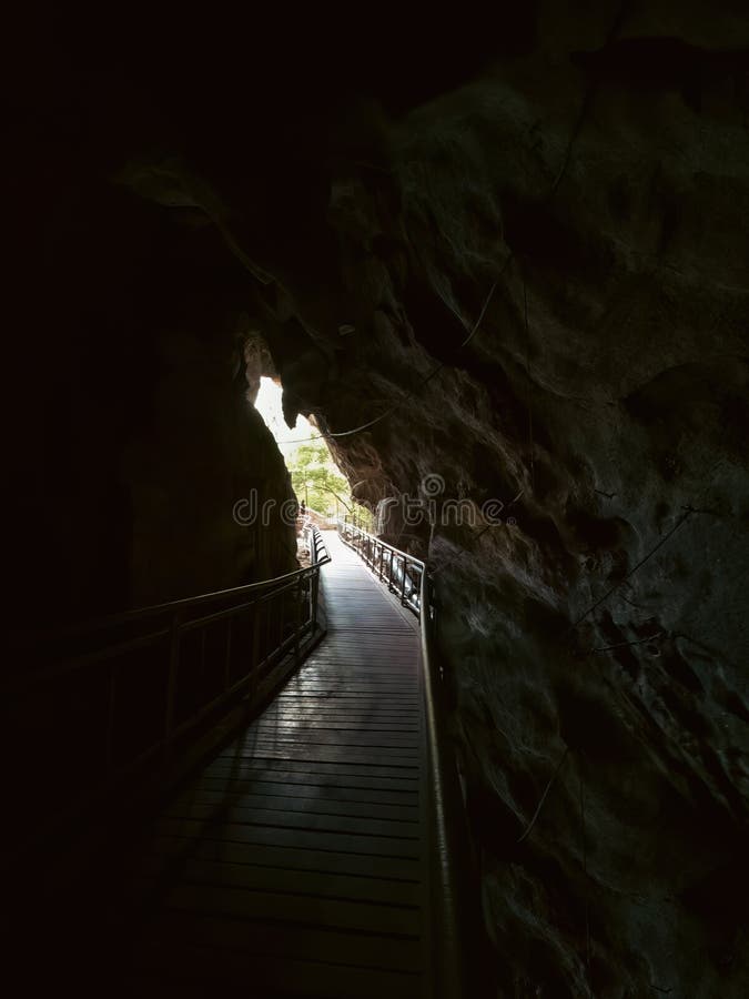 Glowing Exiting the Cave with Walking Path in Kelam Cave, Perlis ...