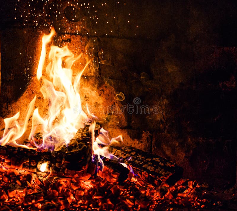 A Glowing Fire in Fireplace Stock Photo - Image of year, fireplace ...