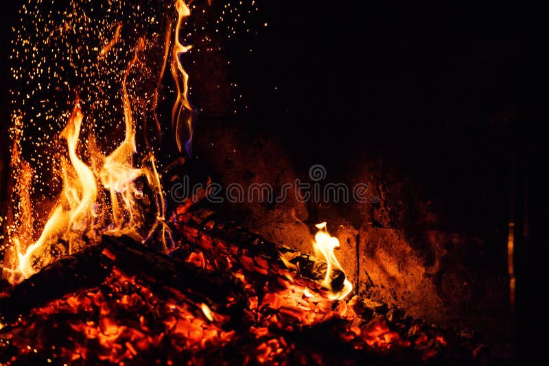 A Glowing Fire in the Stone Fireplace Stock Photo - Image of fire ...