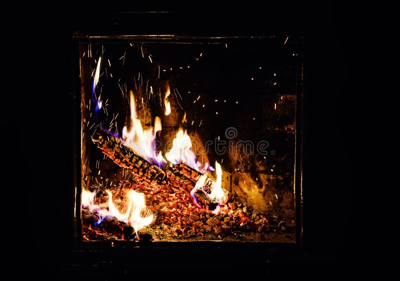 A Glowing Fire in the Stone Fireplace Stock Image - Image of family ...