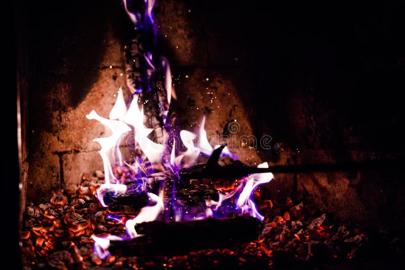 A Glowing Fire in the Stone Fireplace Stock Image - Image of winter ...