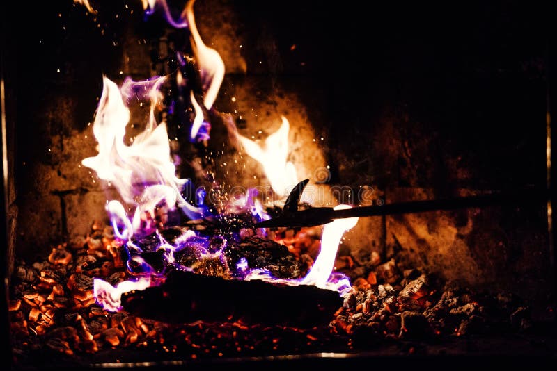 A Glowing Fire in the Stone Fireplace Stock Photo - Image of fireside ...