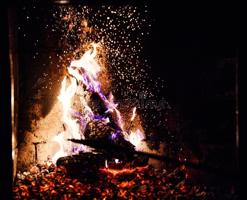A Glowing Fire in the Stone Fireplace Stock Photo - Image of year ...