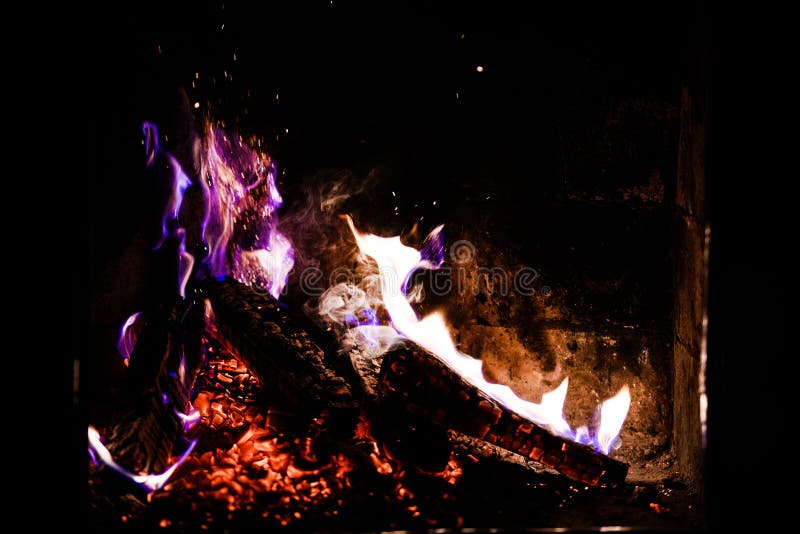A Glowing Fire in the Stone Fireplace Stock Photo - Image of fire ...