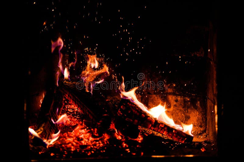A Glowing Fire in the Stone Fireplace Stock Photo - Image of living ...