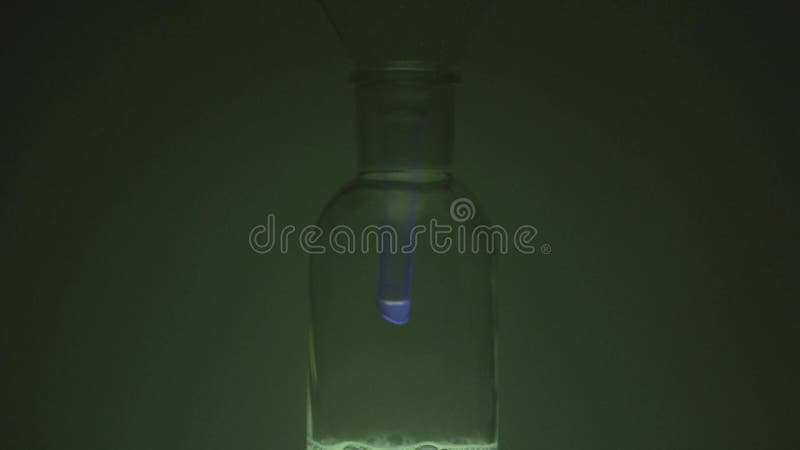 Glowing Fluorescent Substance Mixed with Clear Water in Chemistry ...