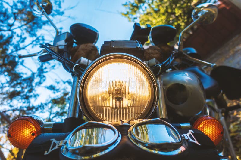 Glowing Front Headlight of a Motorcycle Stock Image - Image of ...