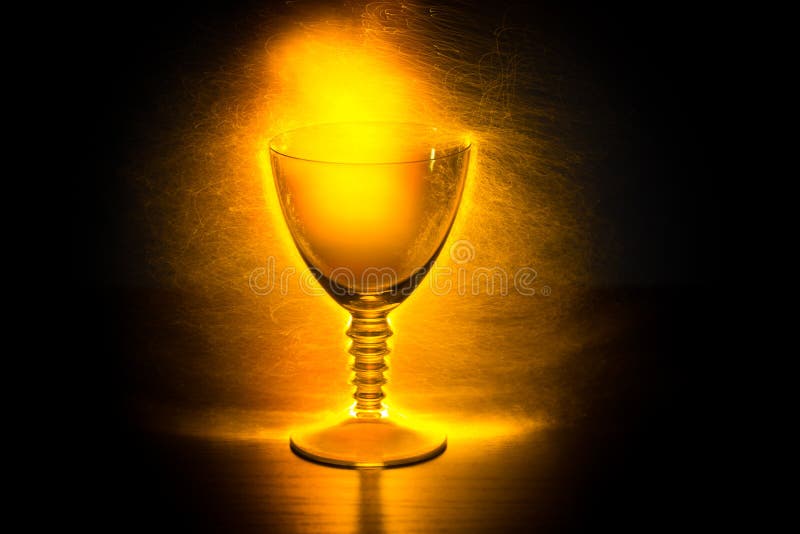 Gold Chalice in Altar with a Ray of Divine Light Stock Image - Image of ...