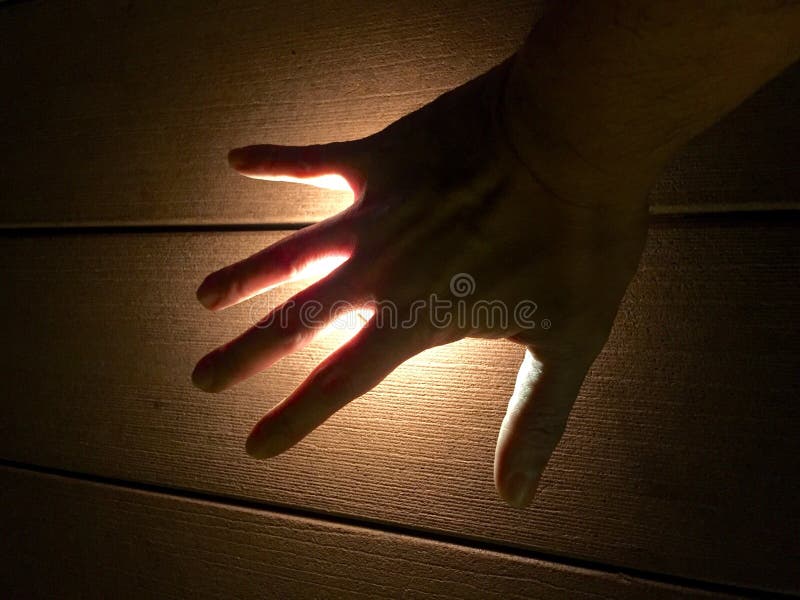 Glowing hand stock image. Image of bulb, hand, glowing - 70389799