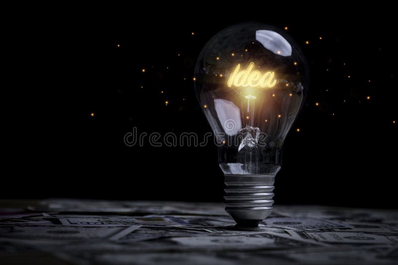 Glowing Idea Inside Lightbulb on Banknotes for Creative Thinking Idea ...