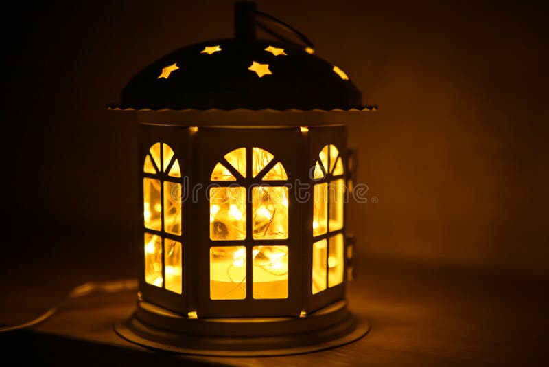 Glowing Lantern in the Shape of a House with Windows Lit Yellow. Stock ...