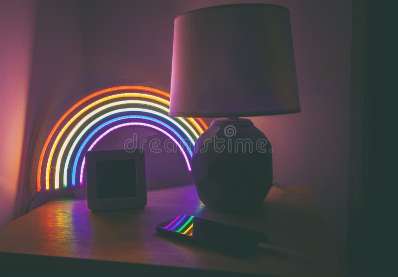 Glowing Led Neon Rainbow on the Side Table Stock Photo - Image of idea ...
