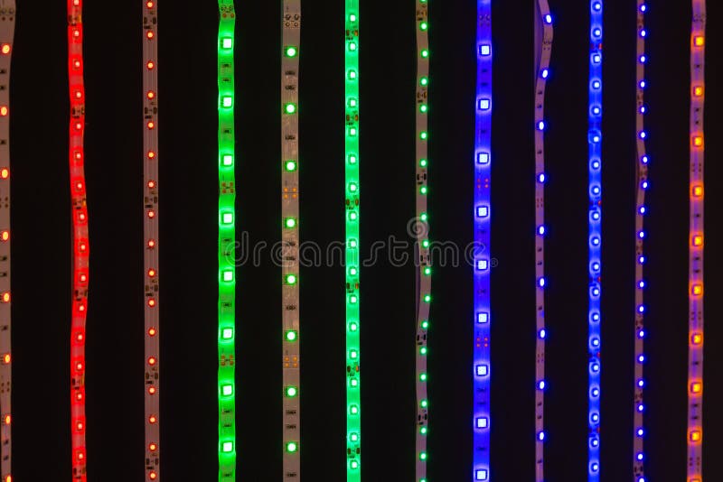 Glowing Led Stripes Different Colours on Black Stock Image - Image of ...